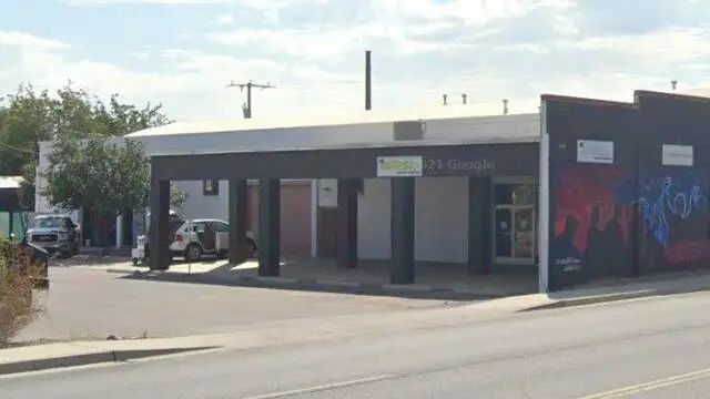 A LARGE SHOP, VISIBLE LOCATION, FENCED YARD & MORE!